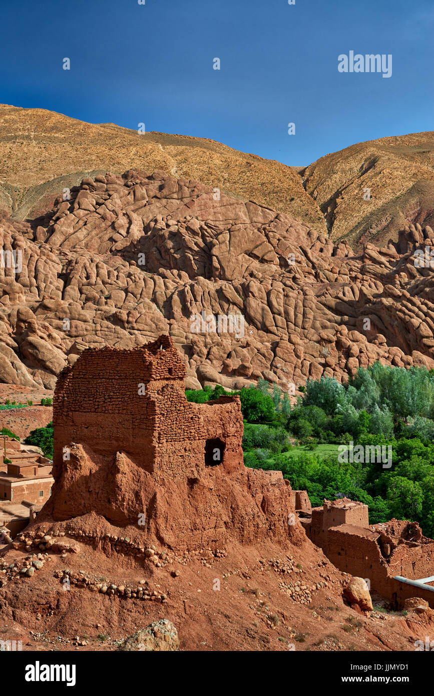 Kasbah in front of spectacular rock landscape of High Atlas mountain ...