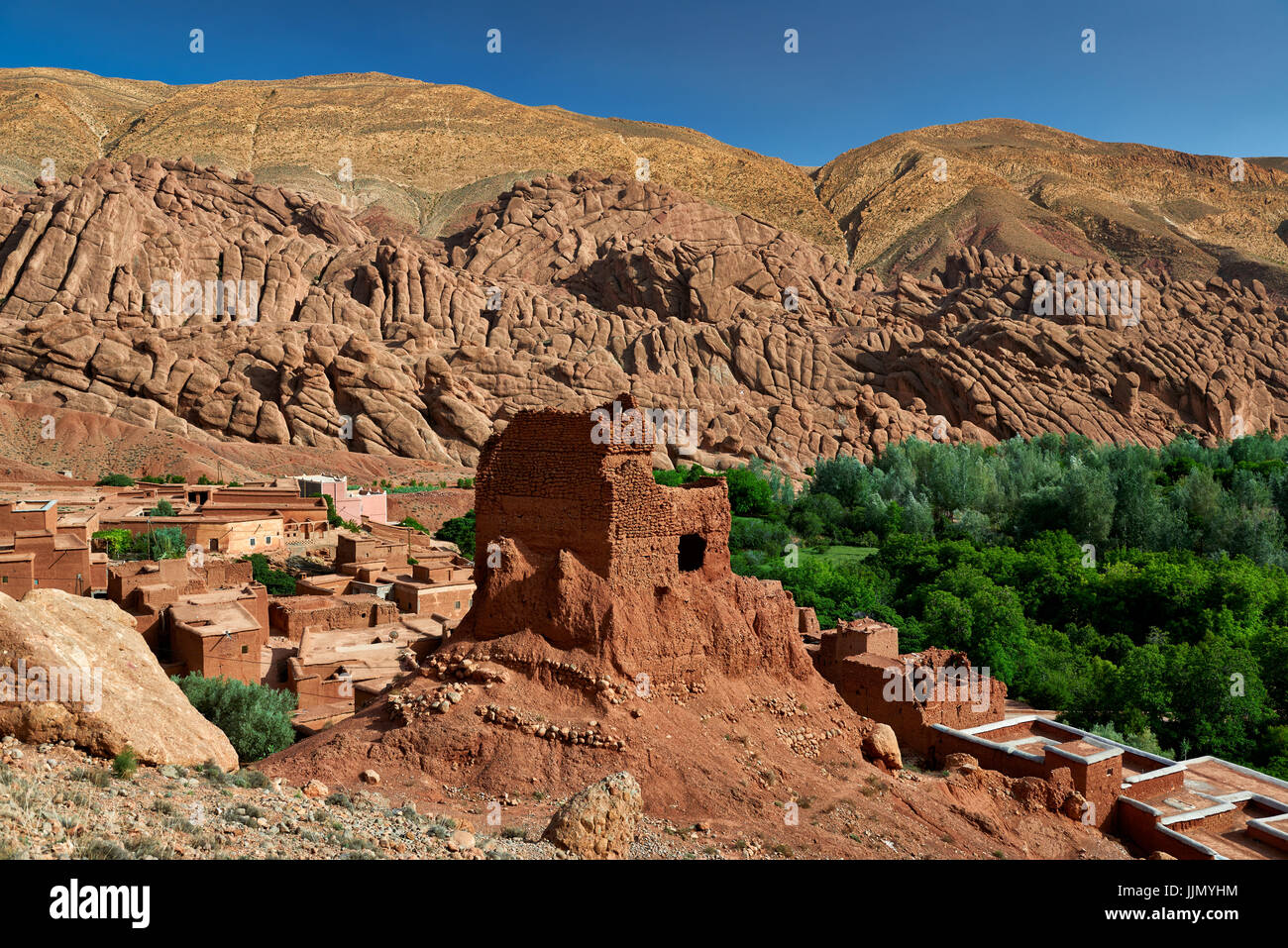 Kasbah in front of spectacular rock landscape of High Atlas mountain ...