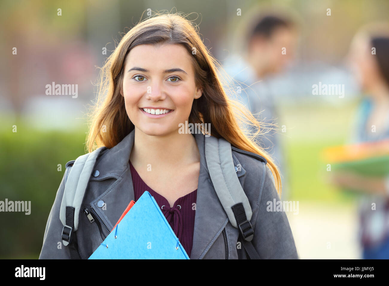 One happy student posing looking at you in an university campus Stock ...