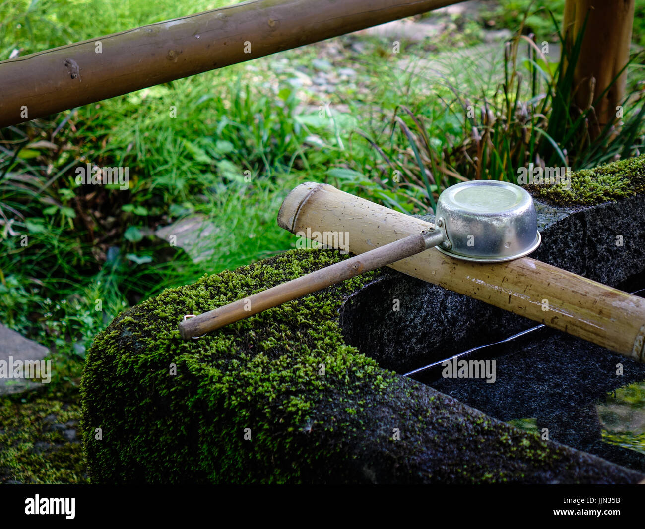 A Japanese ladle at Shinto temple in Akita, Japan. In Japan, a tsukubai ...