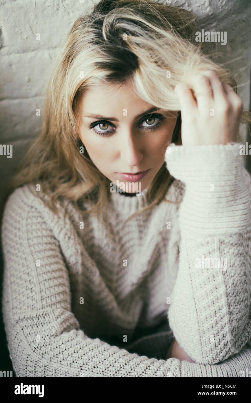 Beautiful young woman staring Stock Photo - Alamy Beautiful young woman staring Stock Photo - Alamy