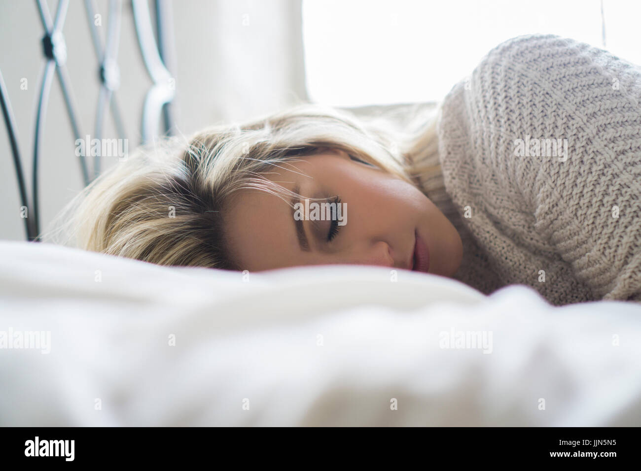 Beautiful blonde woman sleeping hi-res stock photography and images - Alamy