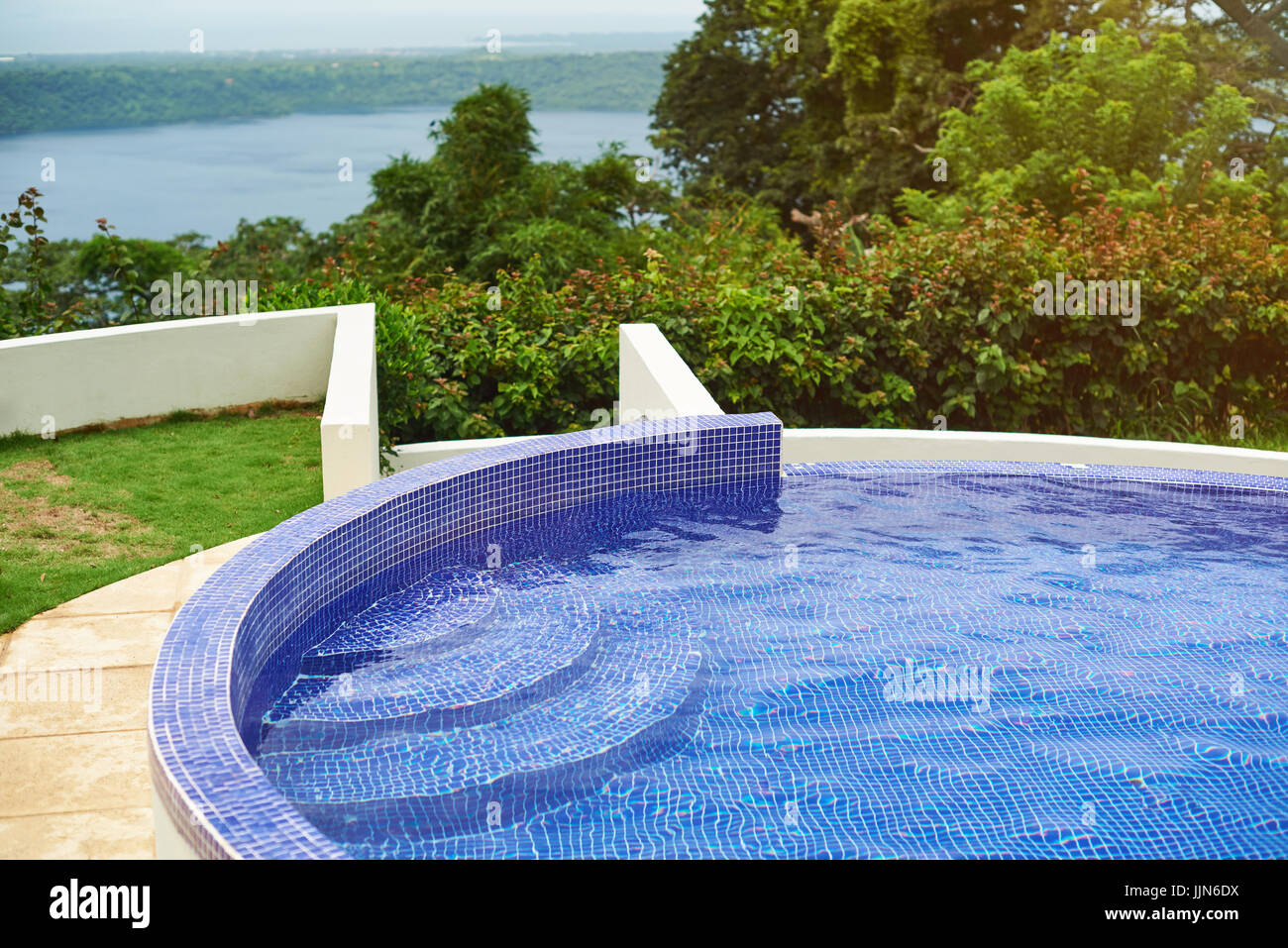 Empty pool in outdoor background. Clean pool in resort Stock Photo - Alamy