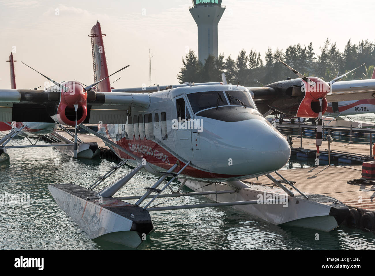 A Trans Maldivian Airways plane is parked at the Seaplane Terminal at ...