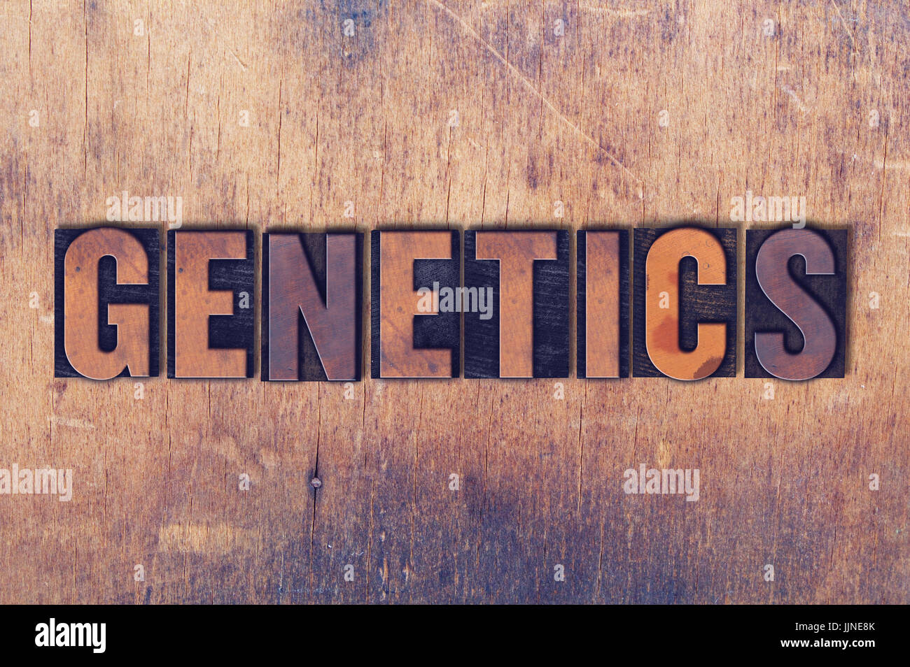 The word Genetics concept and theme written in vintage wooden ...