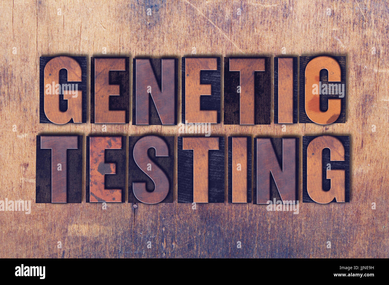 The words Genetic Testing concept and theme written in vintage wooden ...