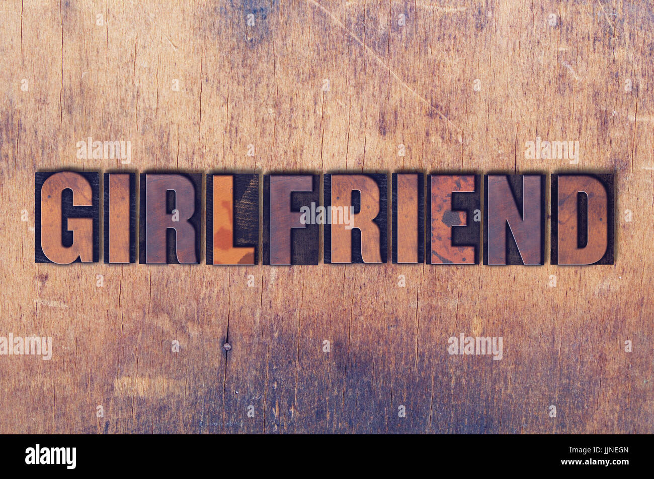 The word Girlfriend concept and theme written in vintage wooden ...