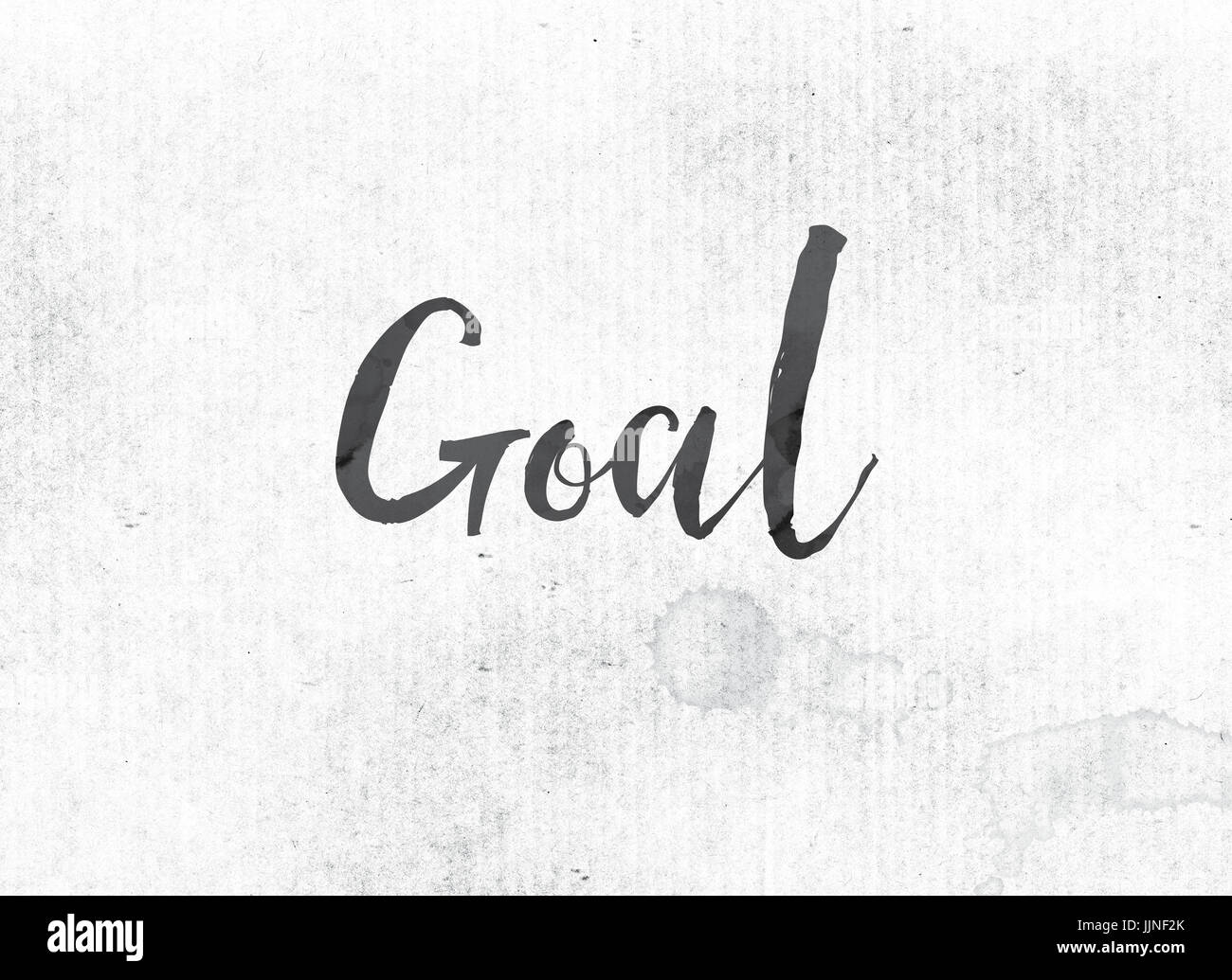 The word Goal concept and theme painted in black ink on a watercolor ...