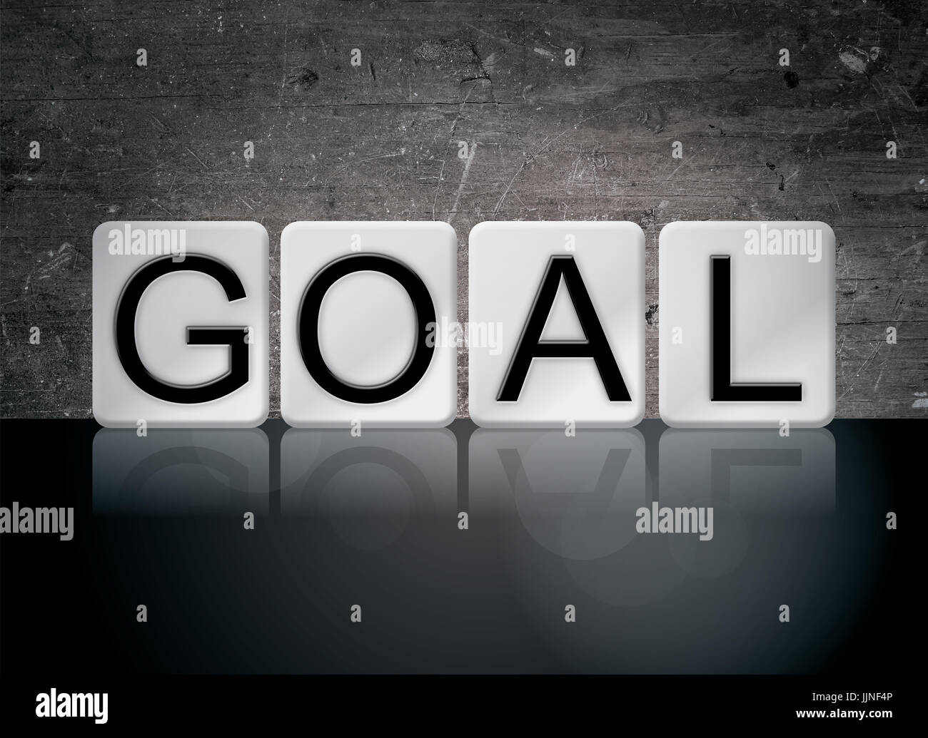 The word Goal concept and theme written in white tiles on a dark ...
