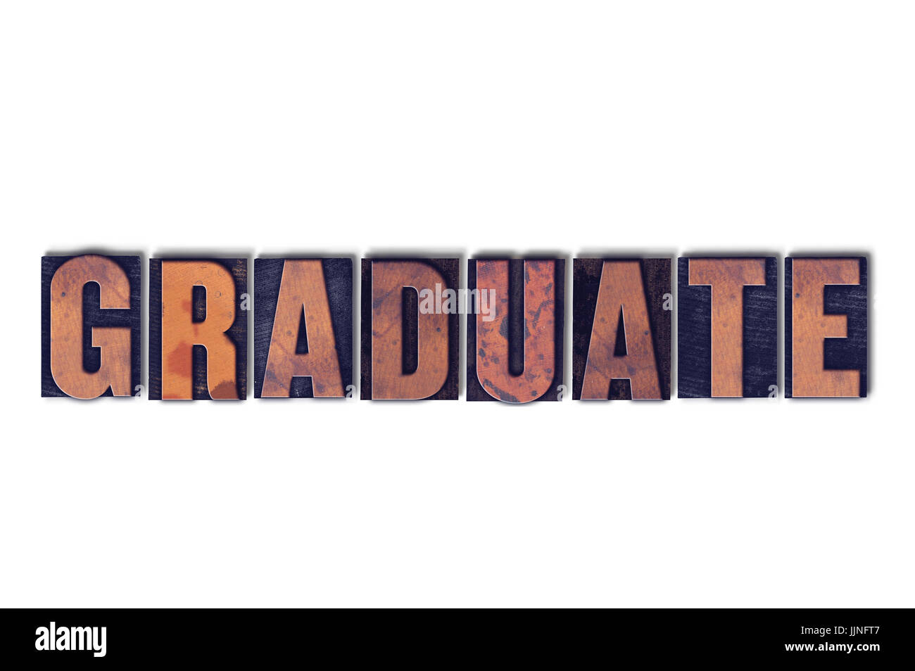 The word Graduate concept and theme written in vintage wooden ...