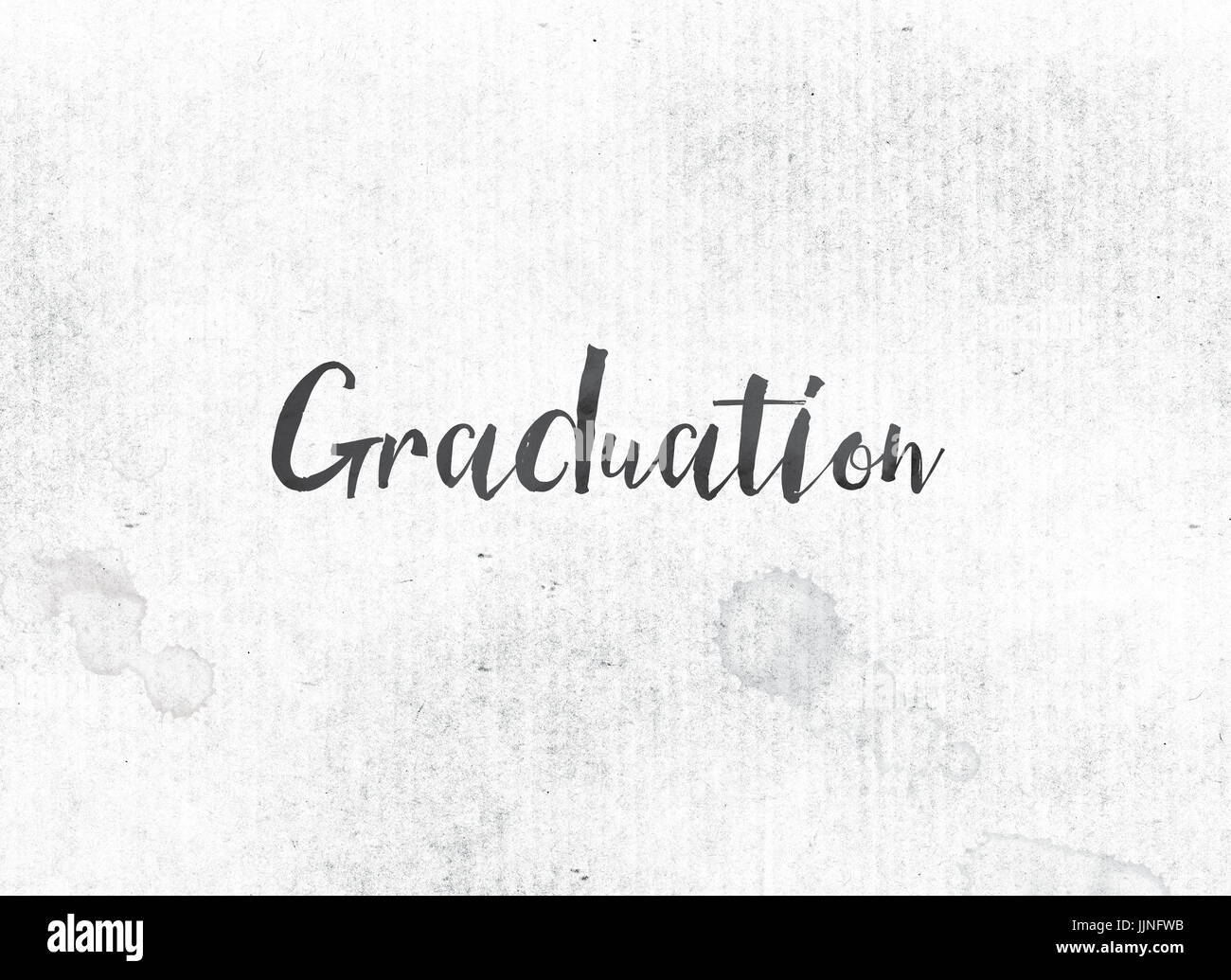 The word Graduation concept and theme painted in black ink on a ...