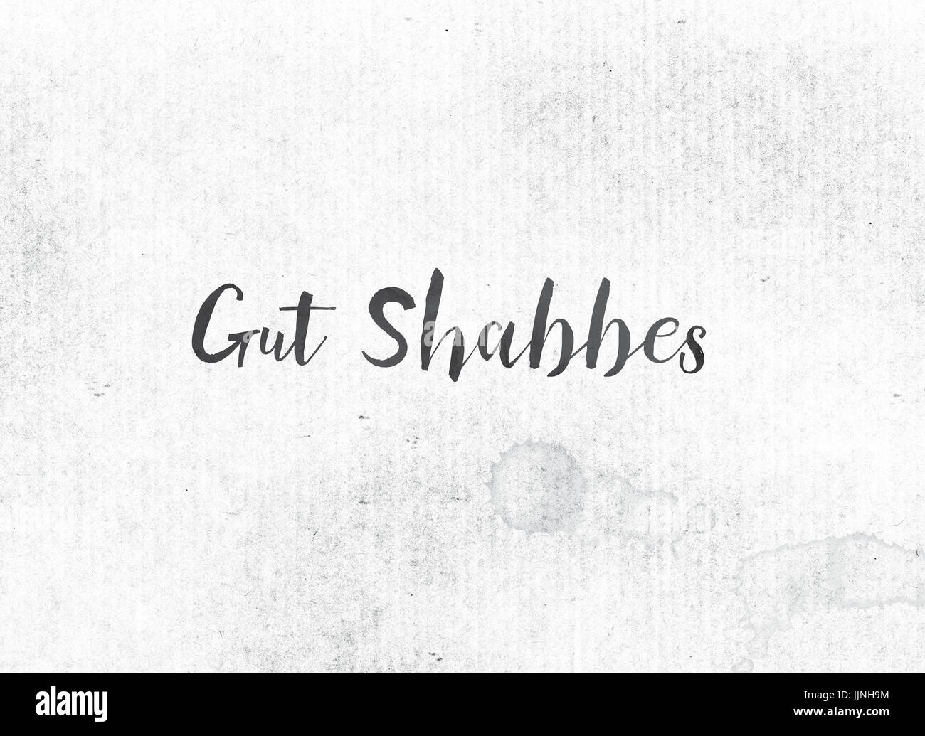 The words Gut Shabbes concept and theme painted in black ink on a ...