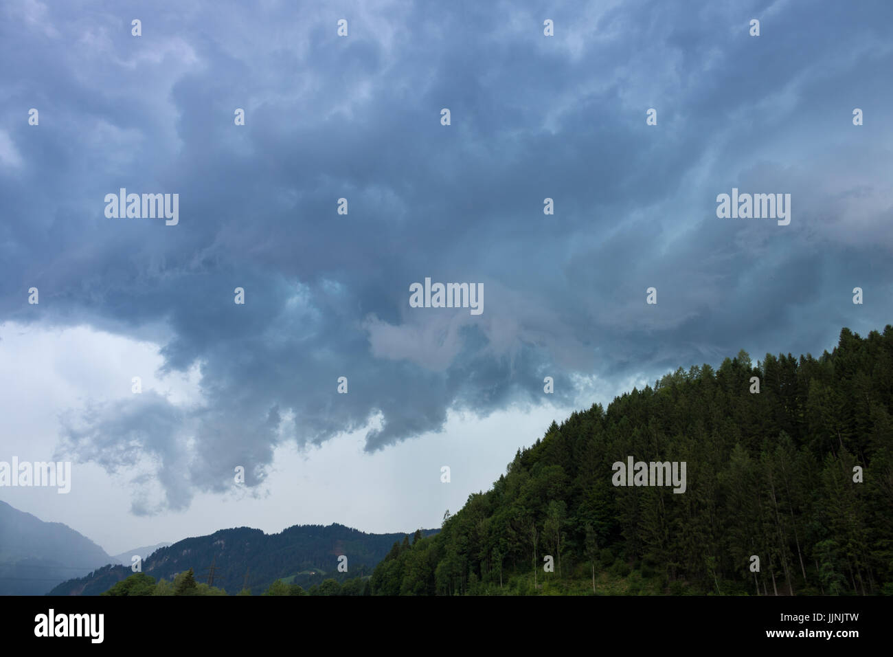 clouds and rain, summer in salzburg, austria Stock Photo - Alamy