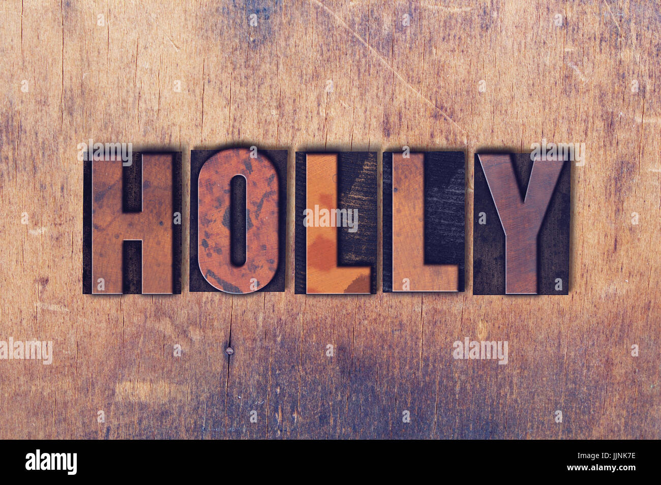 The word Holly concept and theme written in vintage wooden letterpress ...