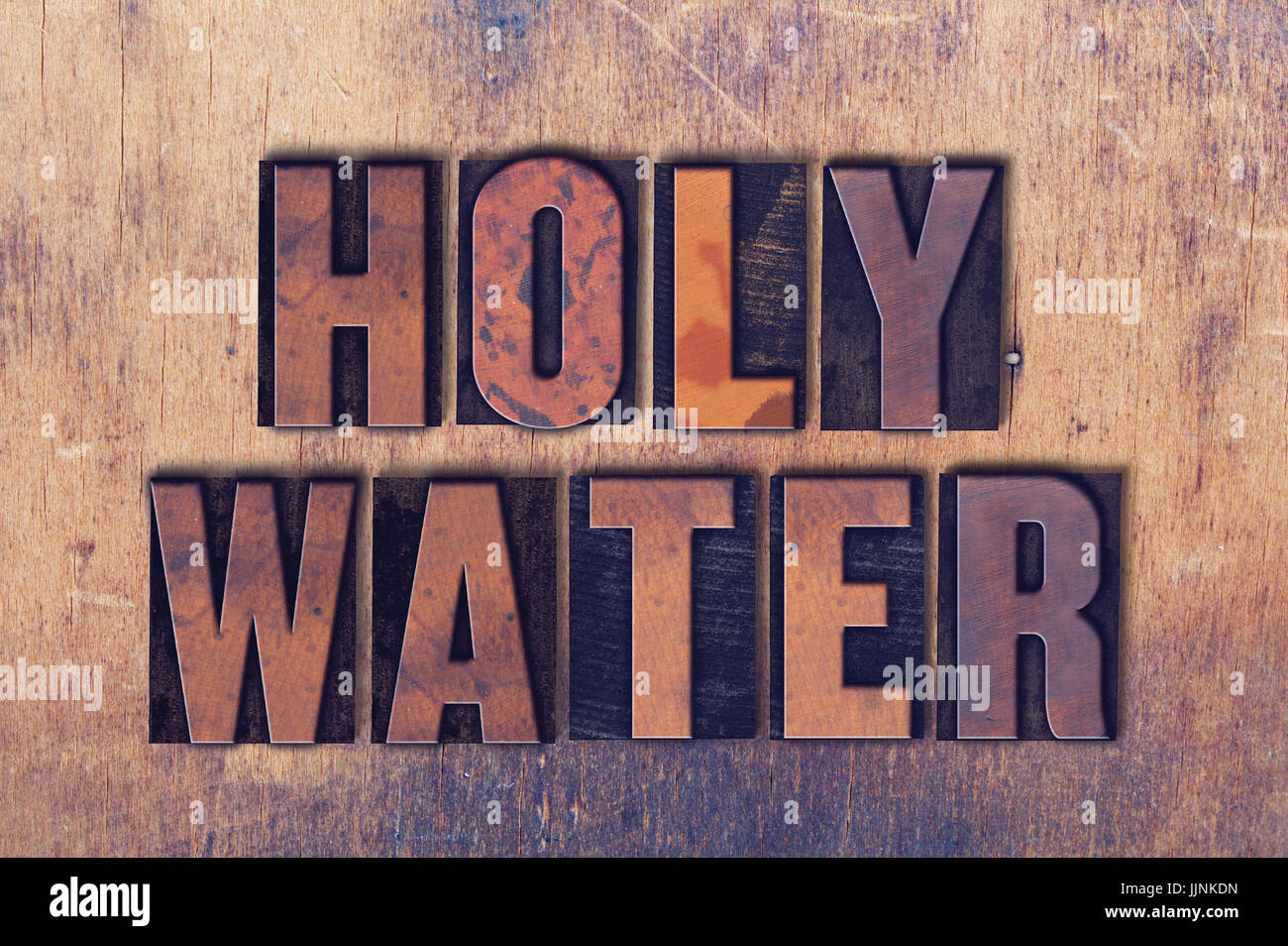 The words Holy Water concept and theme written in vintage wooden ...