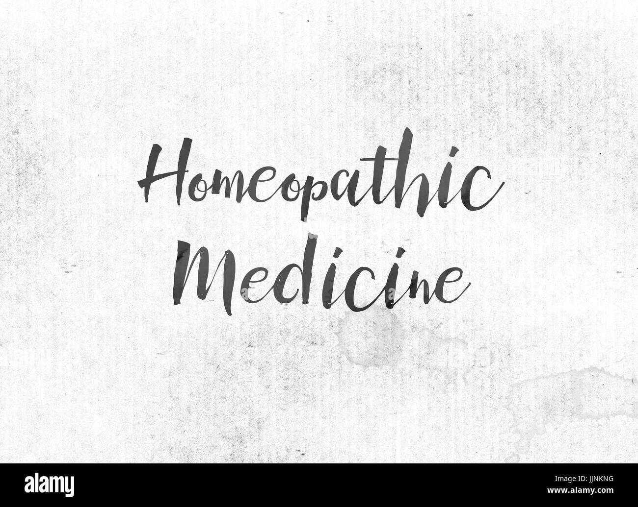 The words Homeopathic Medicine concept and theme painted in black ink ...