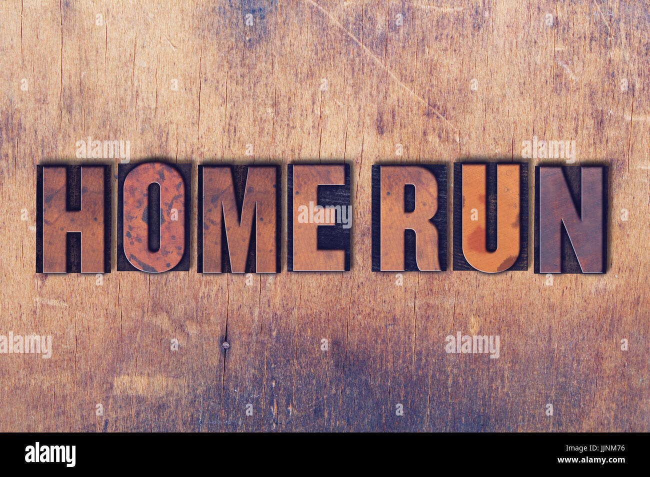 The words Home Run concept and theme written in vintage wooden ...