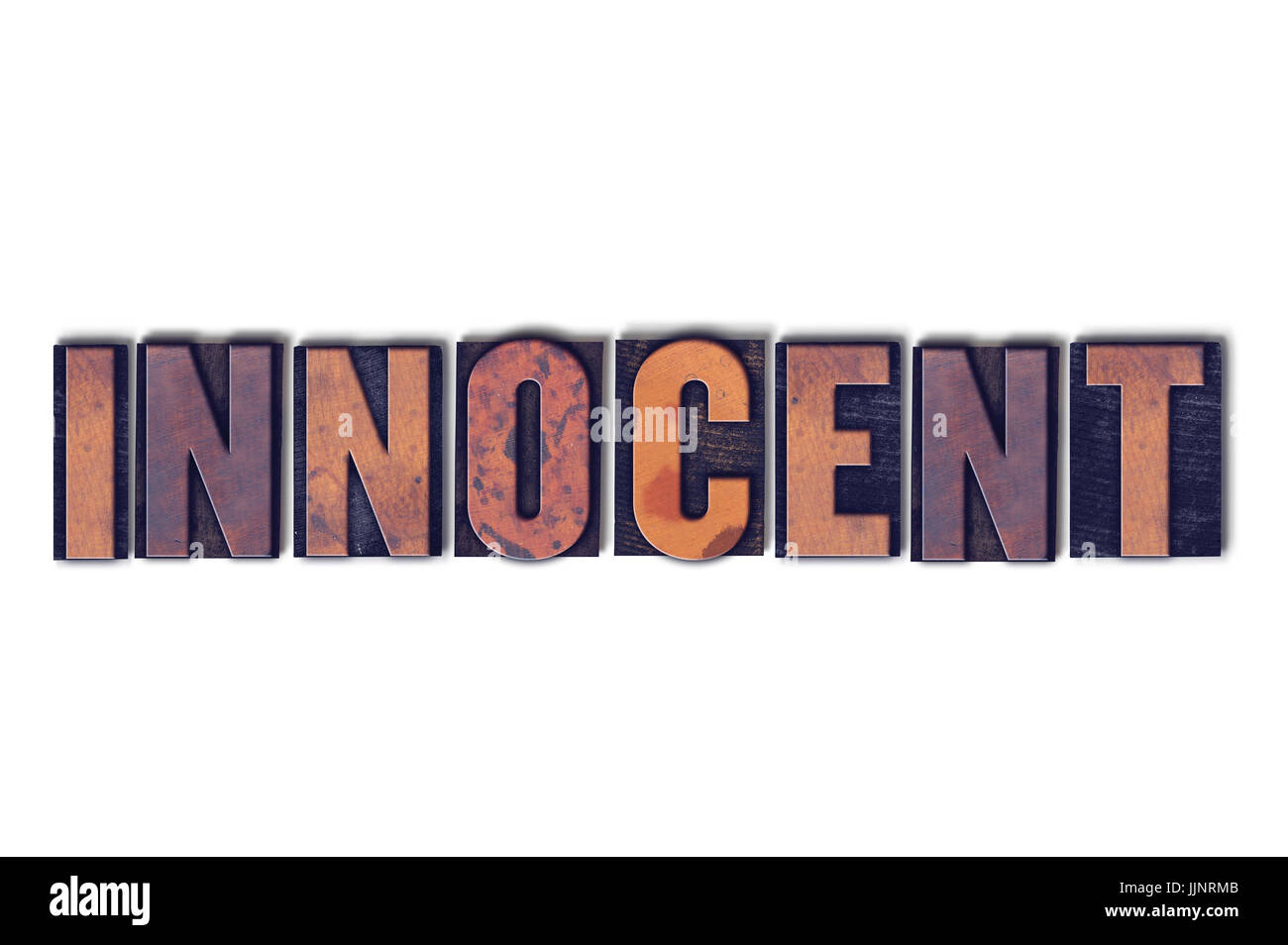 The word Innocent concept and theme written in vintage wooden ...