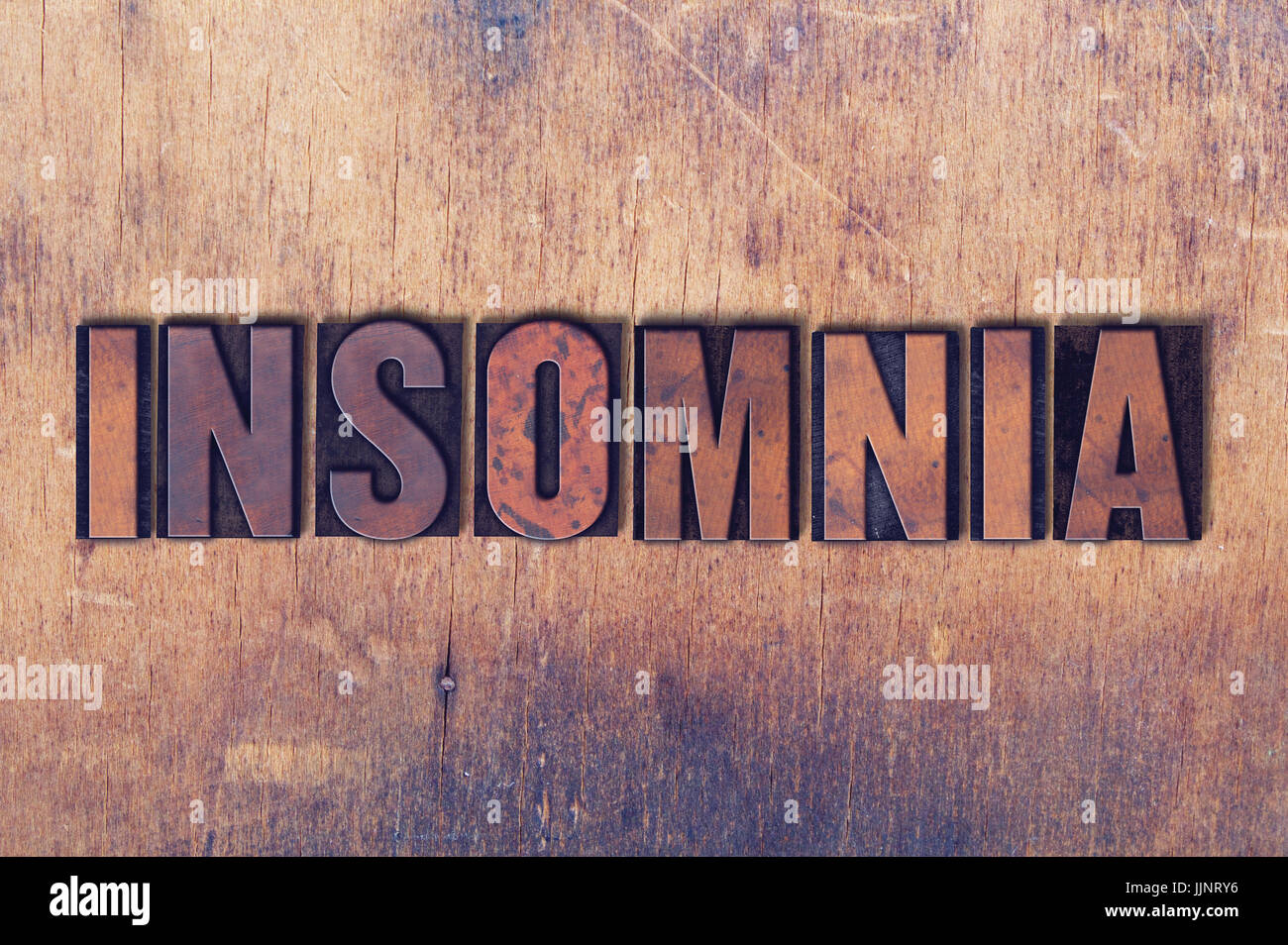 The word Insomnia concept and theme written in vintage wooden ...