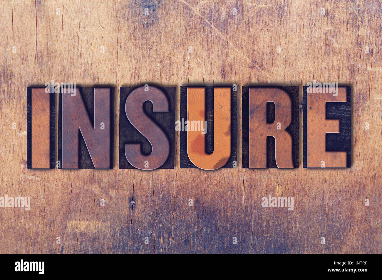 The word Insure concept and theme written in vintage wooden letterpress ...