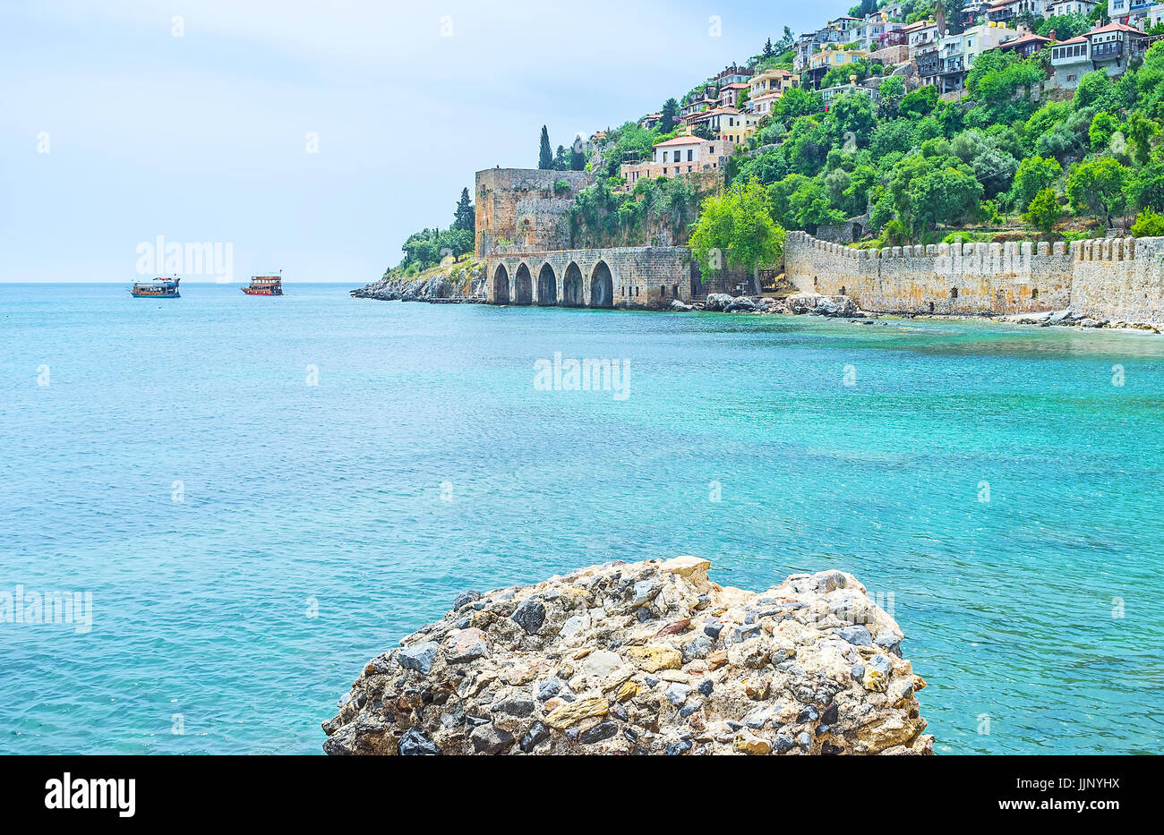 The scenic seascape of Alanya with medieval wall of the fortress ...