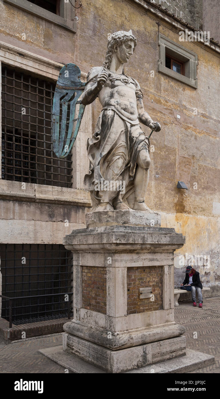 Old statue of Michael the Archangel in yard of Castle Saint Angelo ...