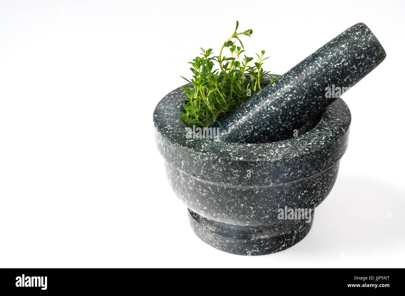 Stone mortar and pestle, exotic cooking tool Stock Photo - Alamy
