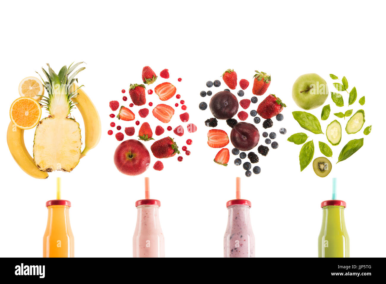 different healthy smoothies in bottles with fresh ingredients isolated ...