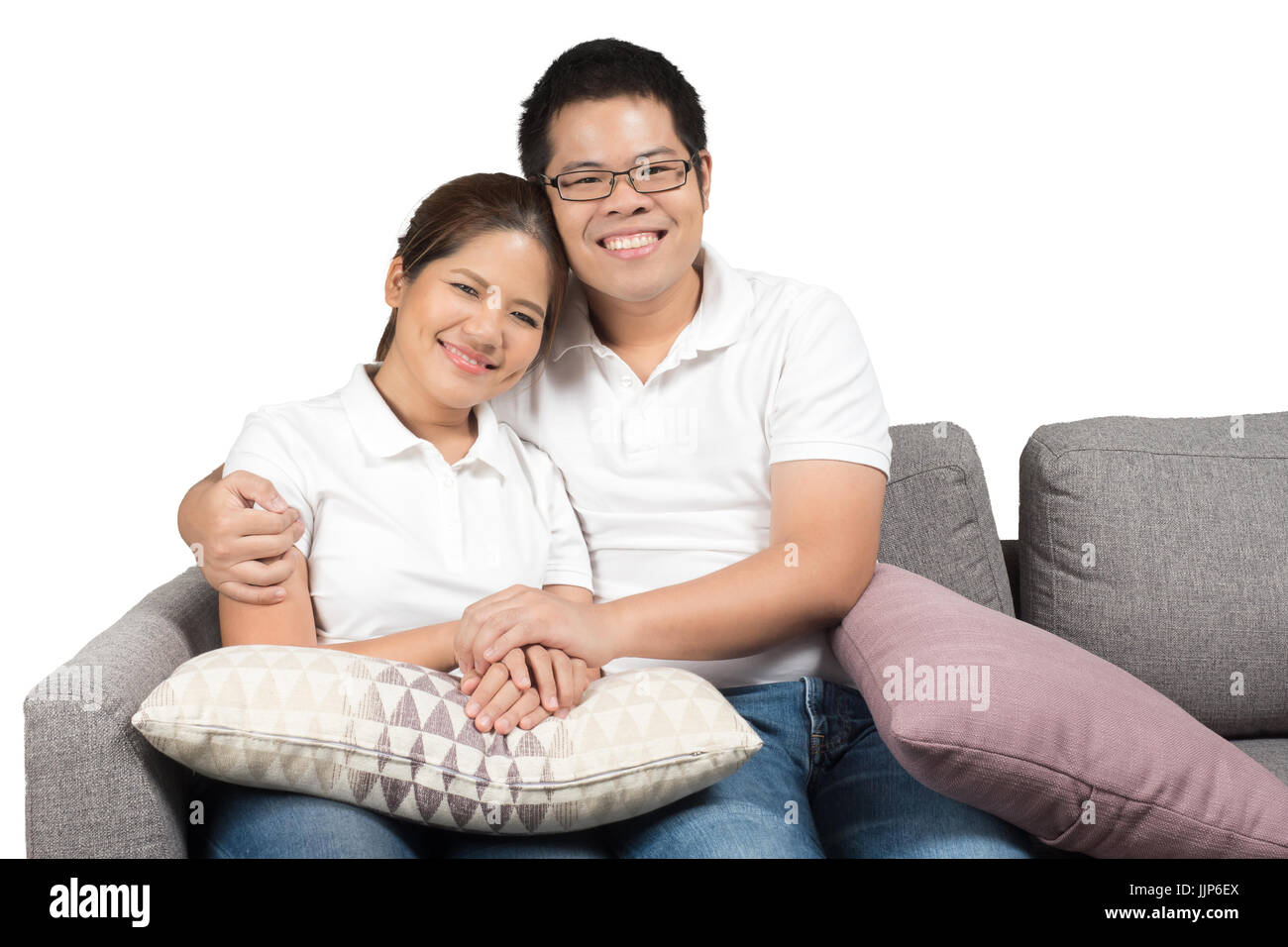 Couple flirting on sofa hi-res stock photography and images - Alamy
