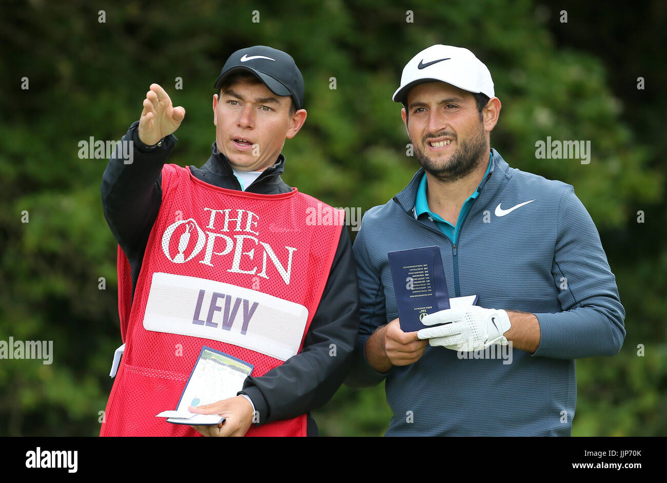France's Alexander Levy speaks with his caddie during day one of The ...