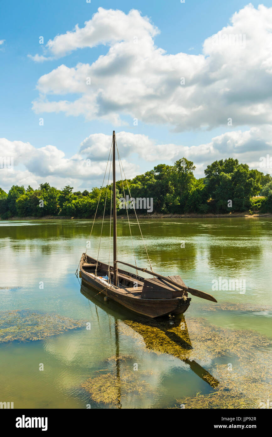 Old boat on the Garonne, a great French river, at this small town near ...