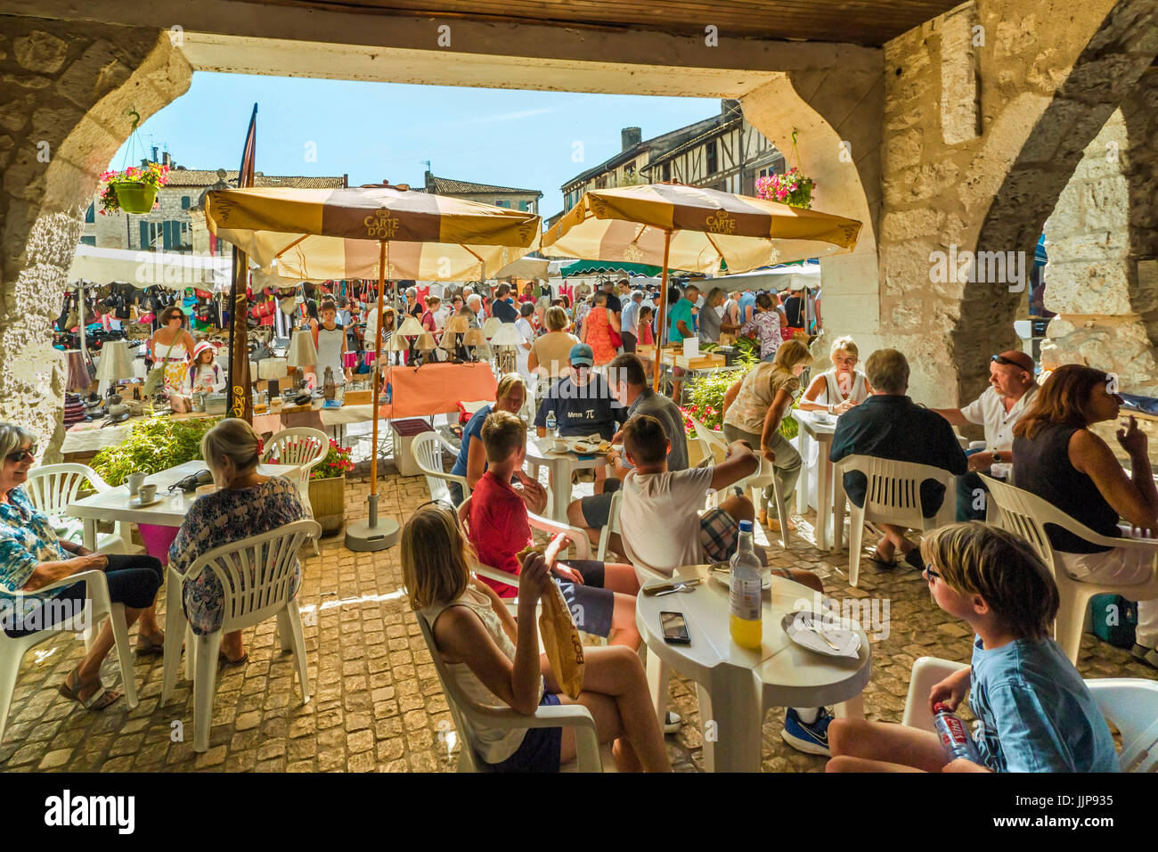People at cafe in arcade off Place Gambetta on market day in this SW ...