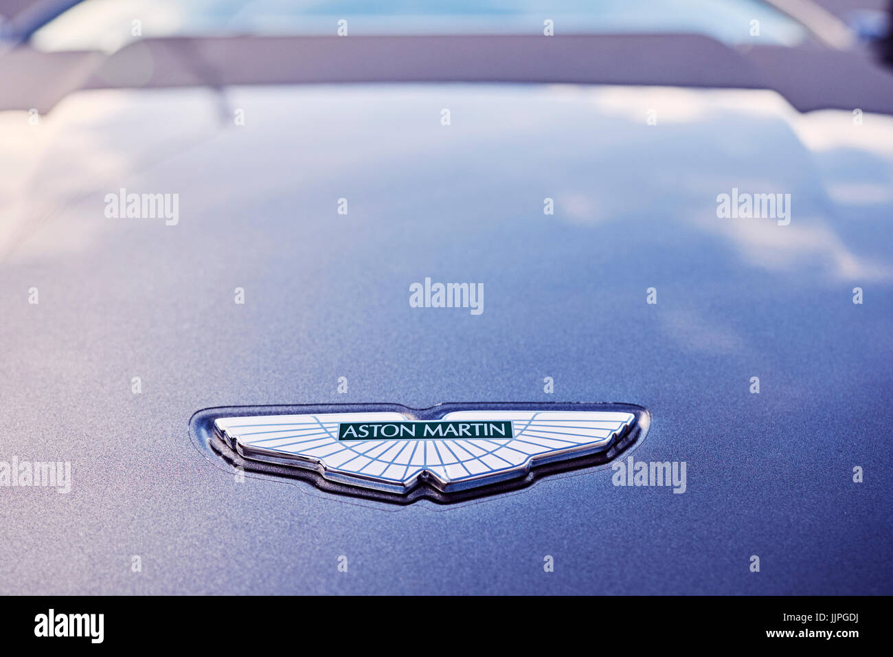 Aston Martin badge on the front of a DB9 Stock Photo - Alamy