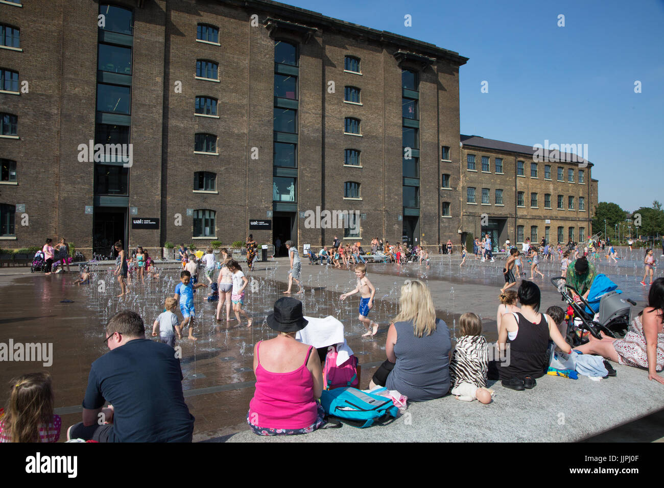 Fountains in Granary Square, London attract youngsters to cool down in ...
