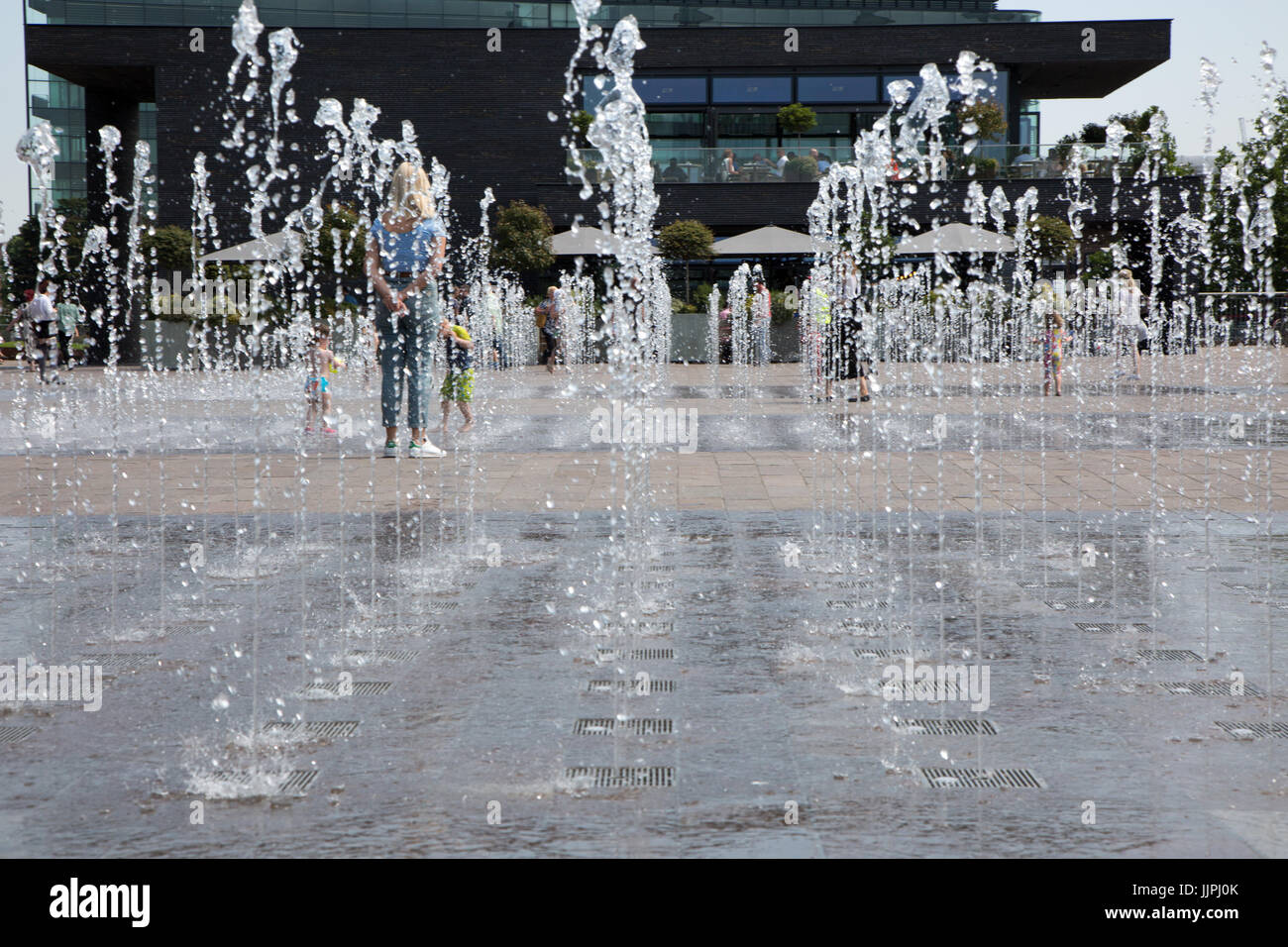 Fountains in Granary Square, London attract youngsters to cool down in ...