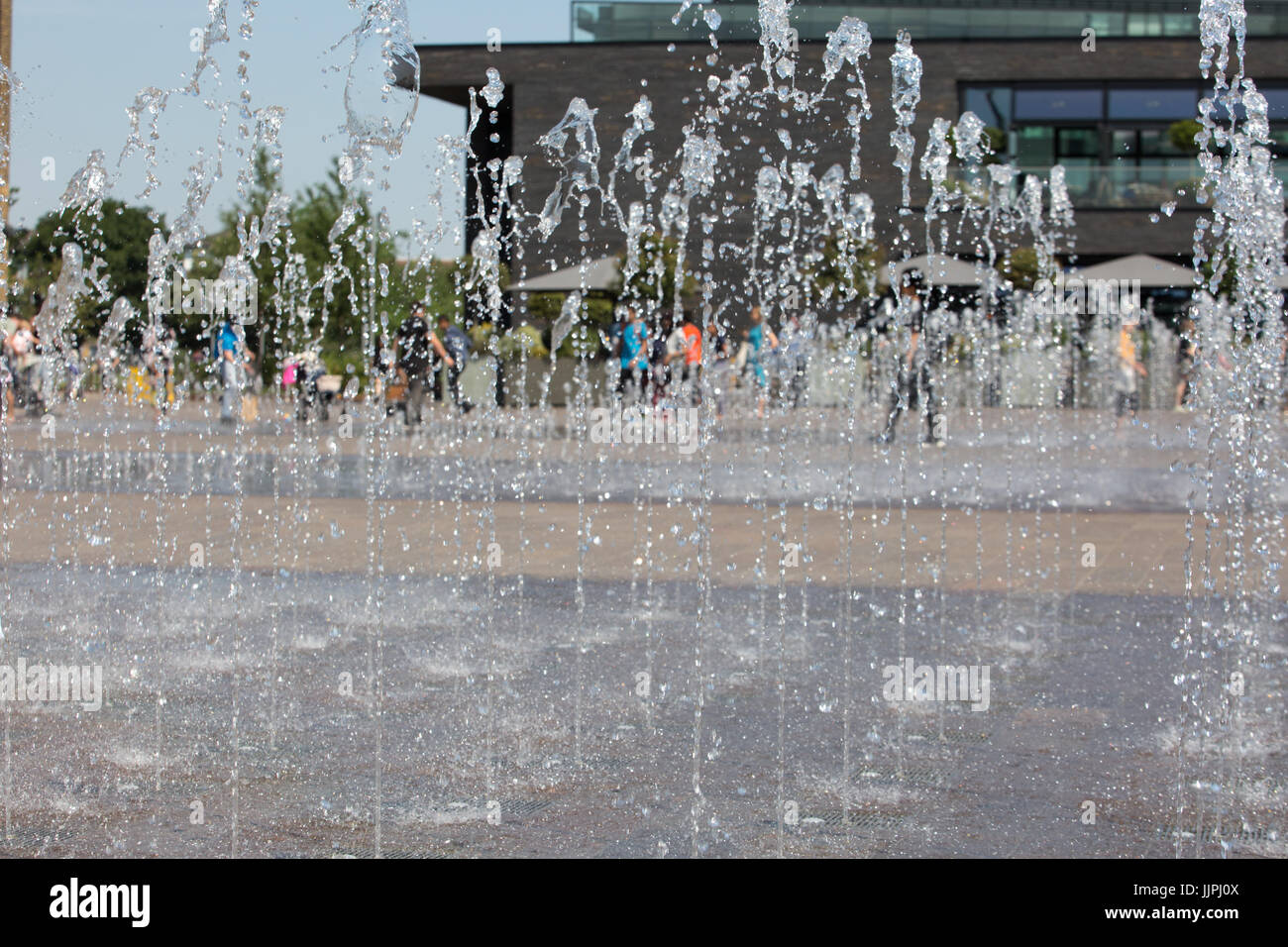 Fountains in Granary Square, London attract youngsters to cool down in ...