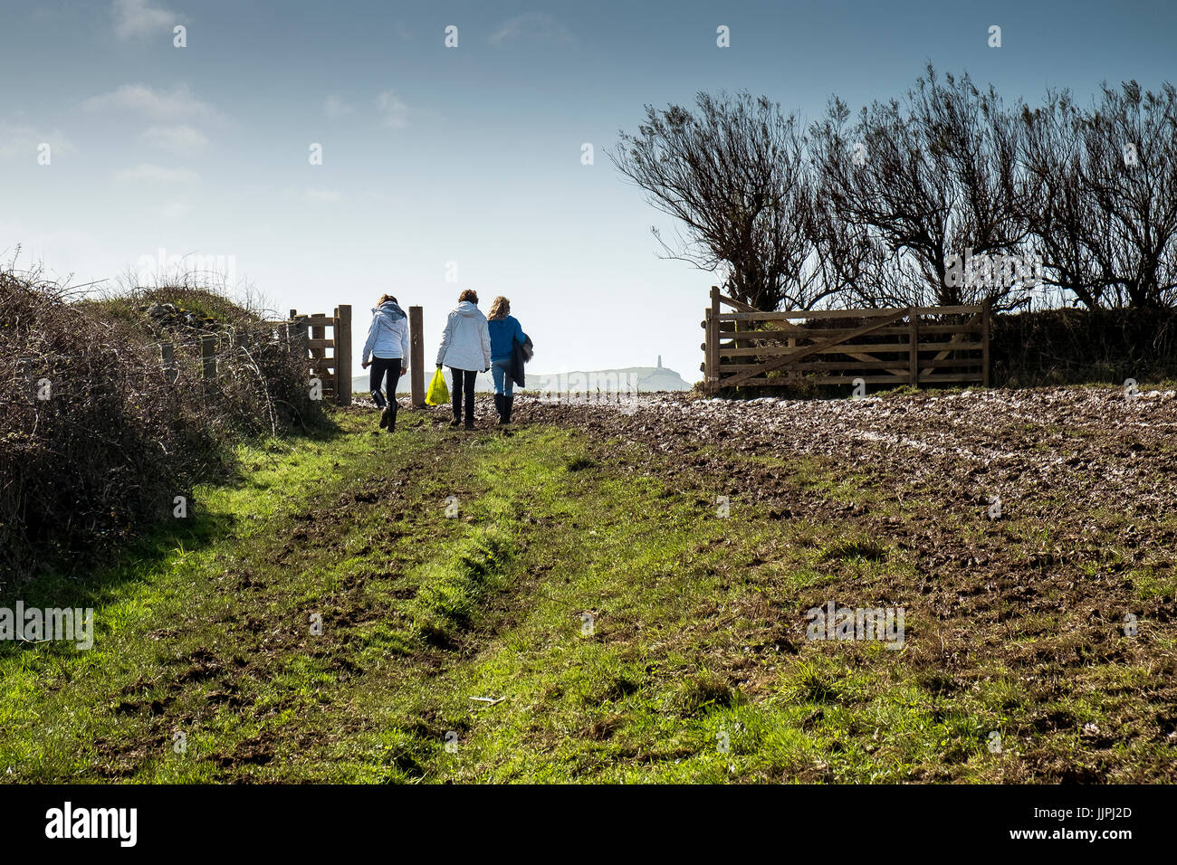 Walking through muddy field hi-res stock photography and images - Alamy