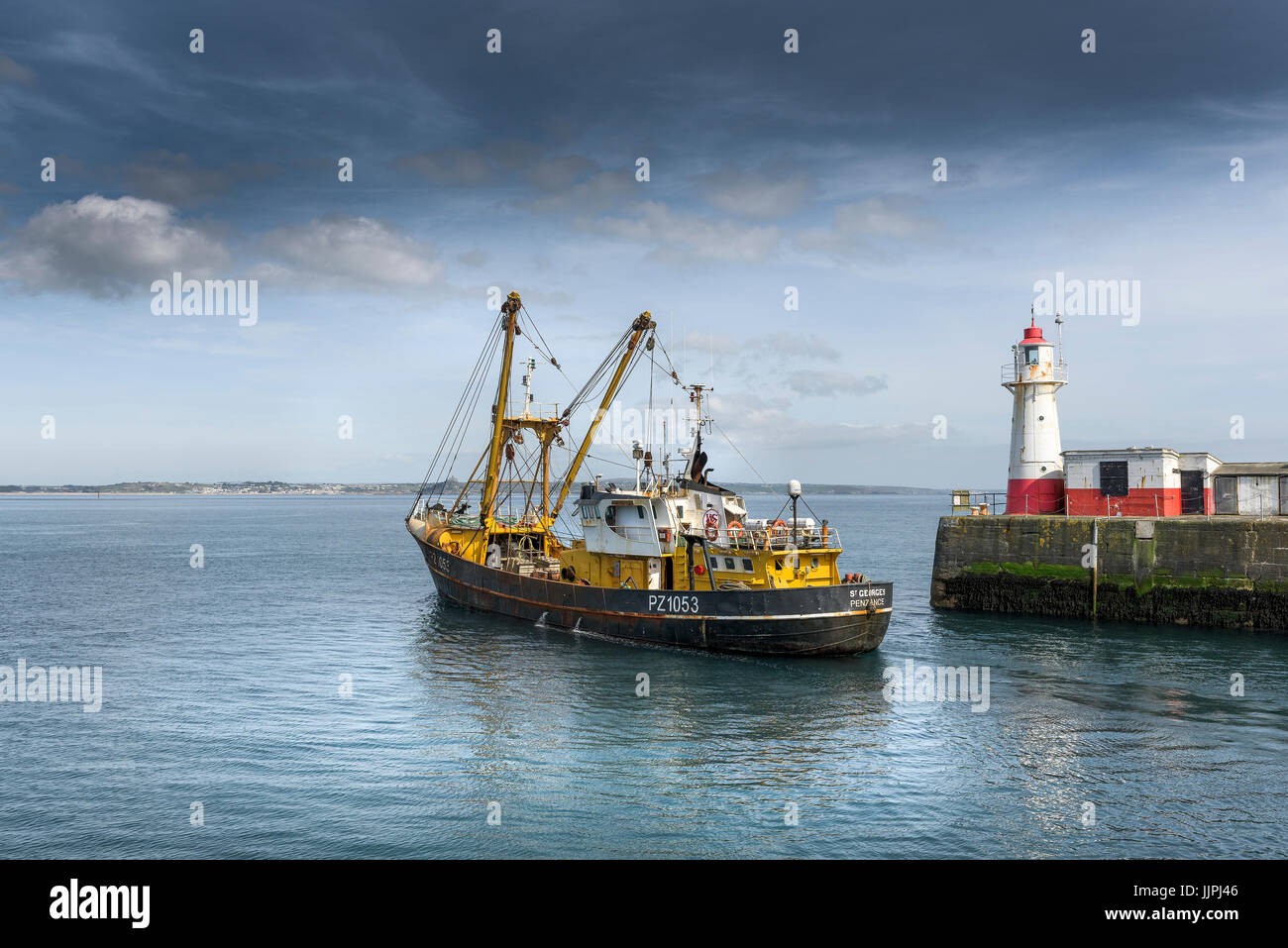 The Beam Trawler PZ1053 St Georges steams out of Newlyn Harbour at the ...