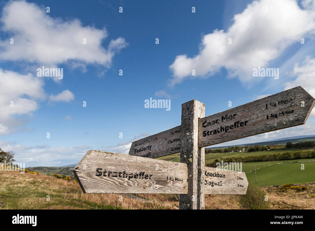 Signs for Strathpeffer on Knockfarrel hill in Scotland Stock Photo - Alamy