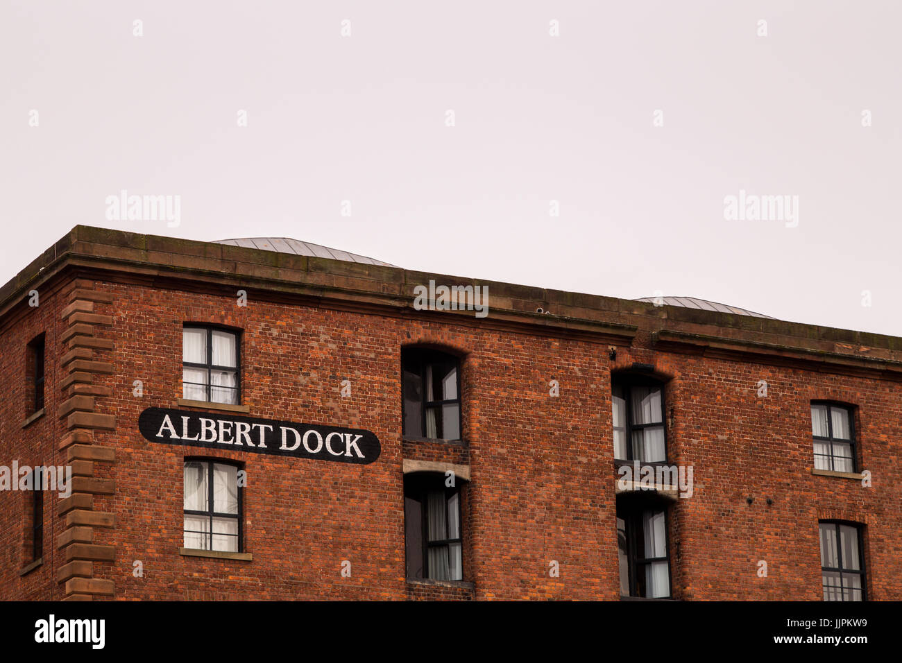 The corner of an old warehouse on the Albert Dock in Liverpool Stock ...