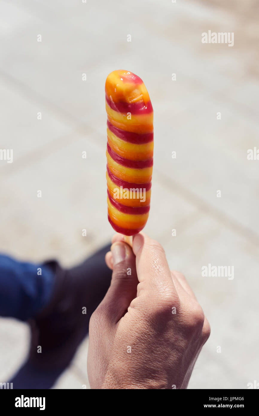 Man eating popsicle not child not woman hi-res stock photography and ...