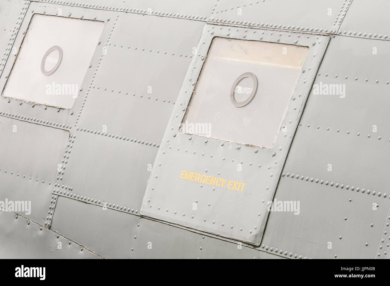 emergency exit hatch on a vintage warbird aircraft Stock Photo - Alamy