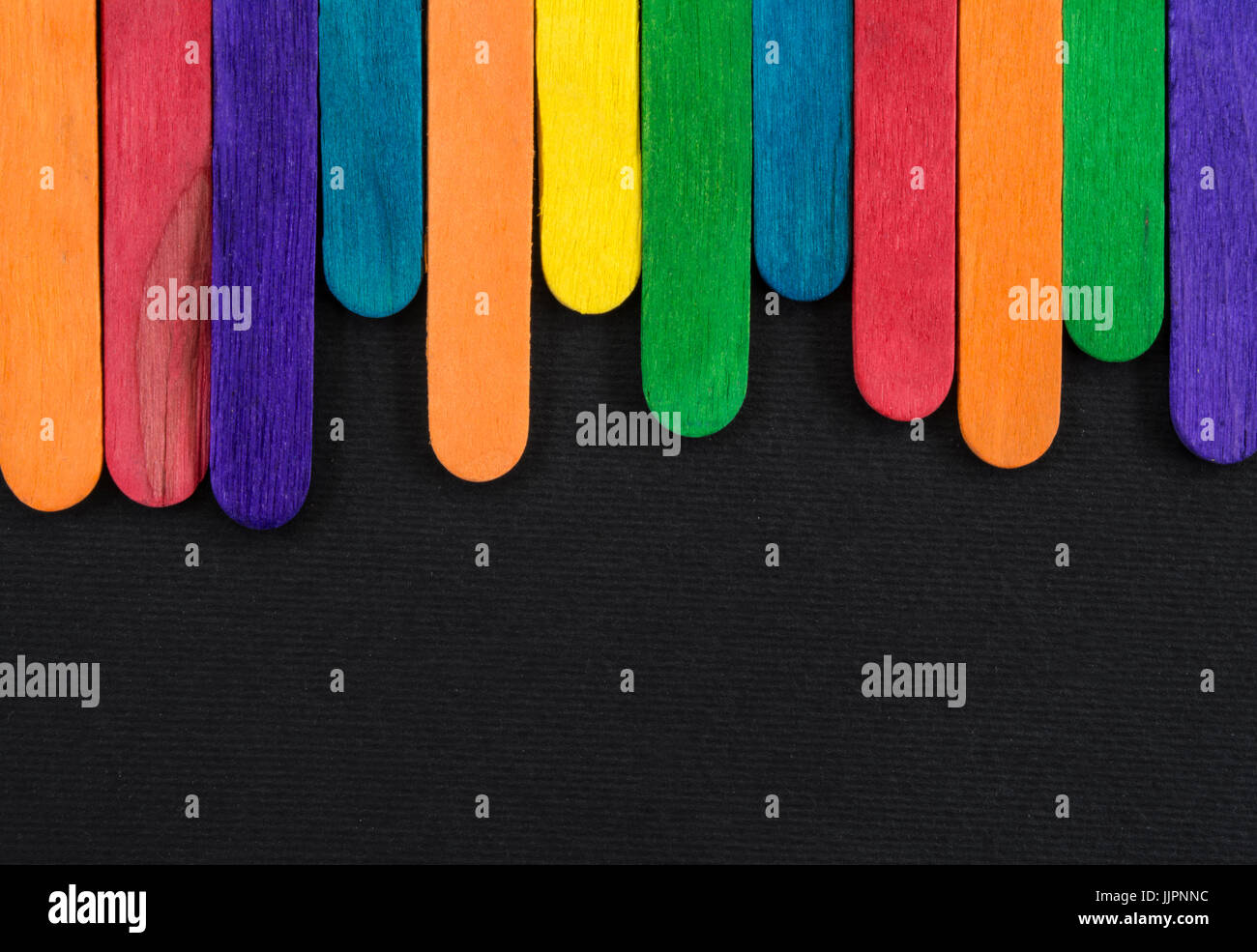 Colourful ice cream sticks. Copy space Stock Photo - Alamy