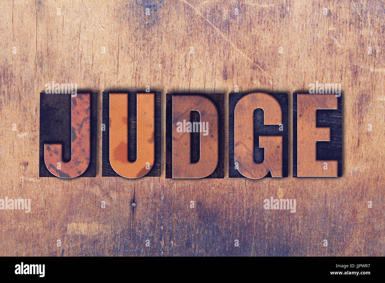 The word Judge concept and theme written in vintage wooden letterpress ...