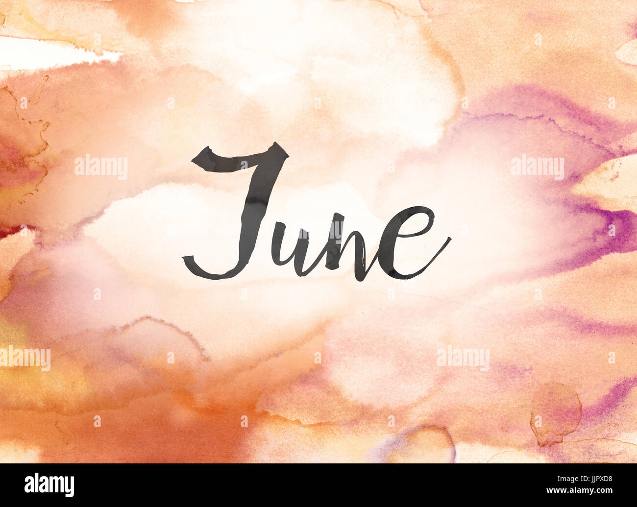The word June concept and theme written in black ink on a colorful ...