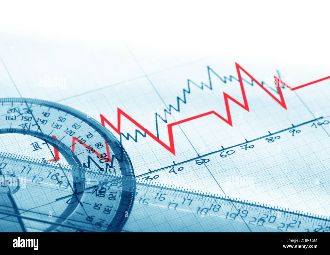Blue plastic rulers on graph paper with diagram Stock Photo - Alamy