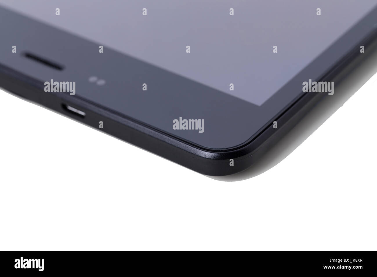 Corner of a tablet computer. Isolated on a white background Stock Photo ...