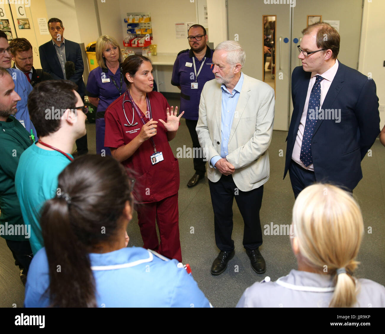 Labour leader Jeremy Corbyn and Gareth Snell MP (right) talk to staff ...