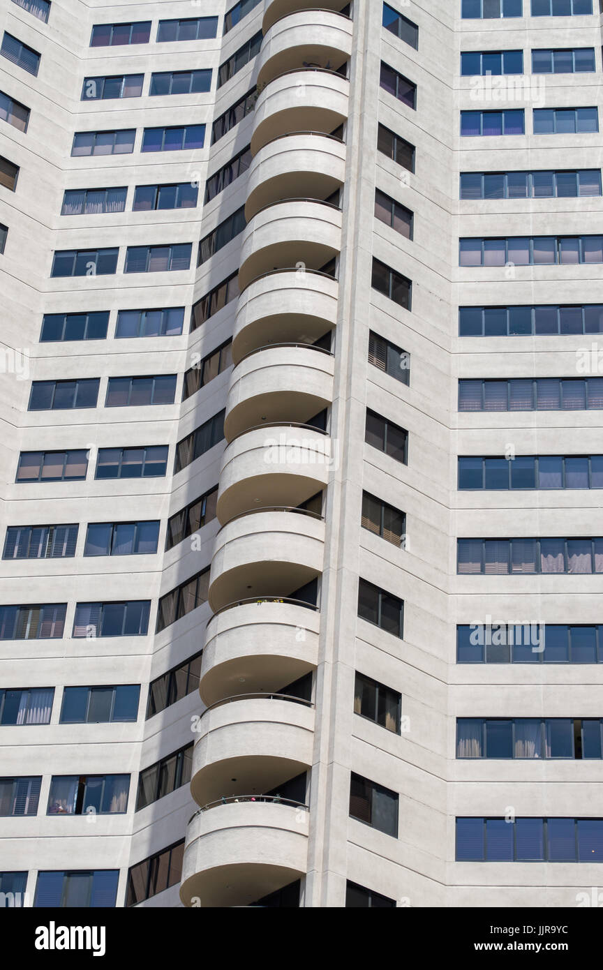 modern high rise building with unique curved design Stock Photo - Alamy