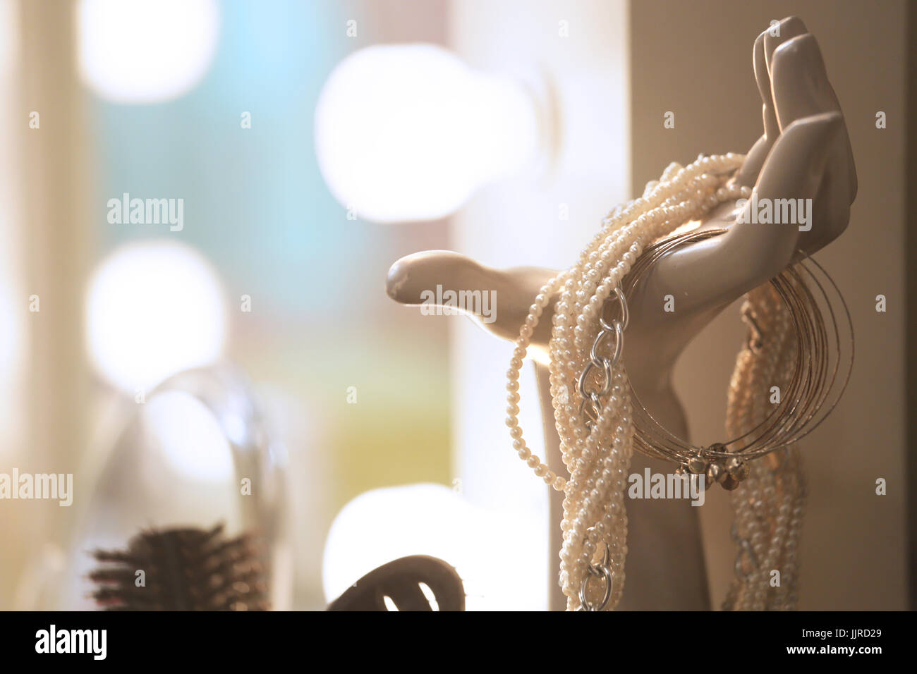 a lot of bracelets hanging on display hand in backstage room Stock ...